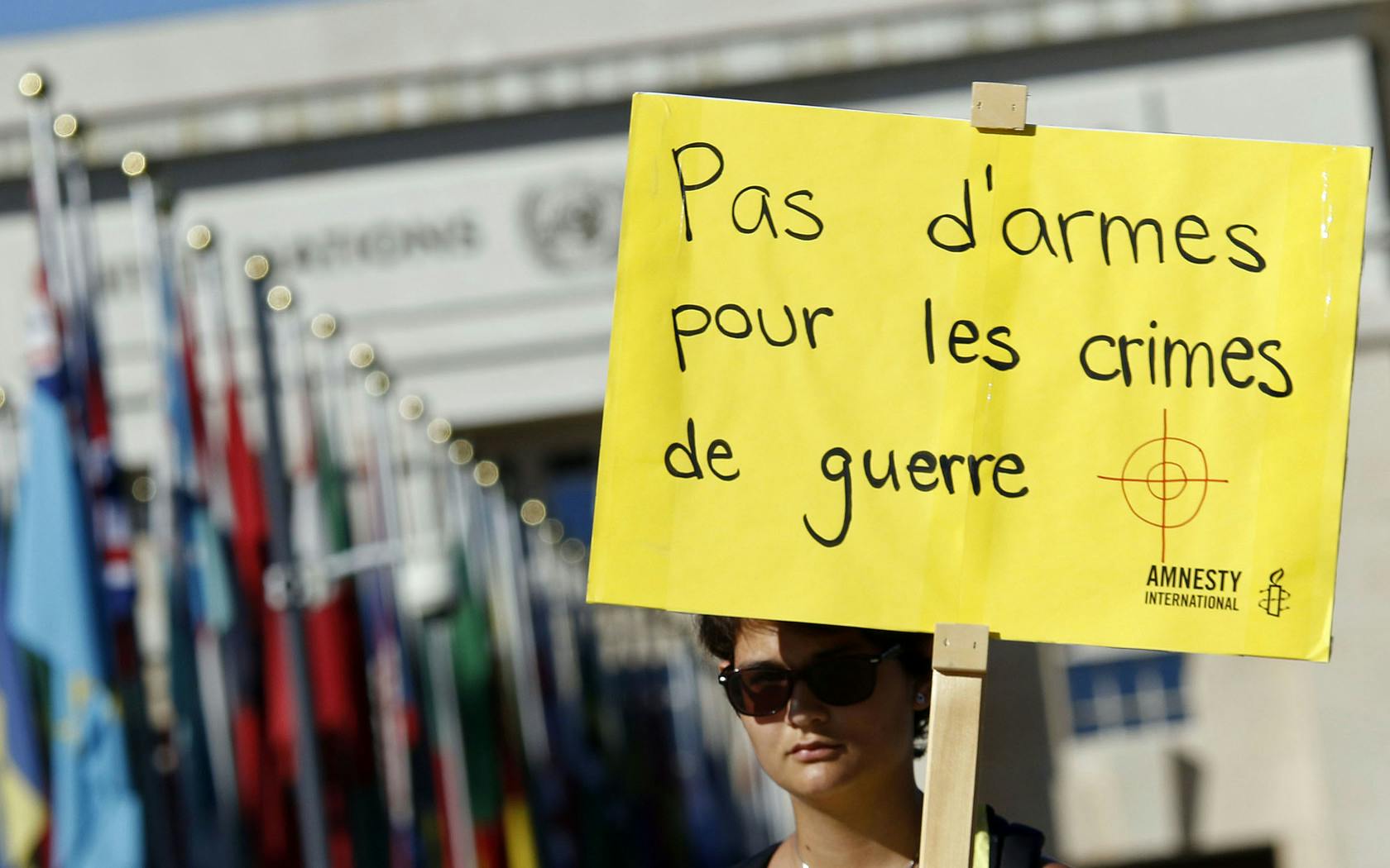 Action d'Amnesty International pendant la conférence © AI