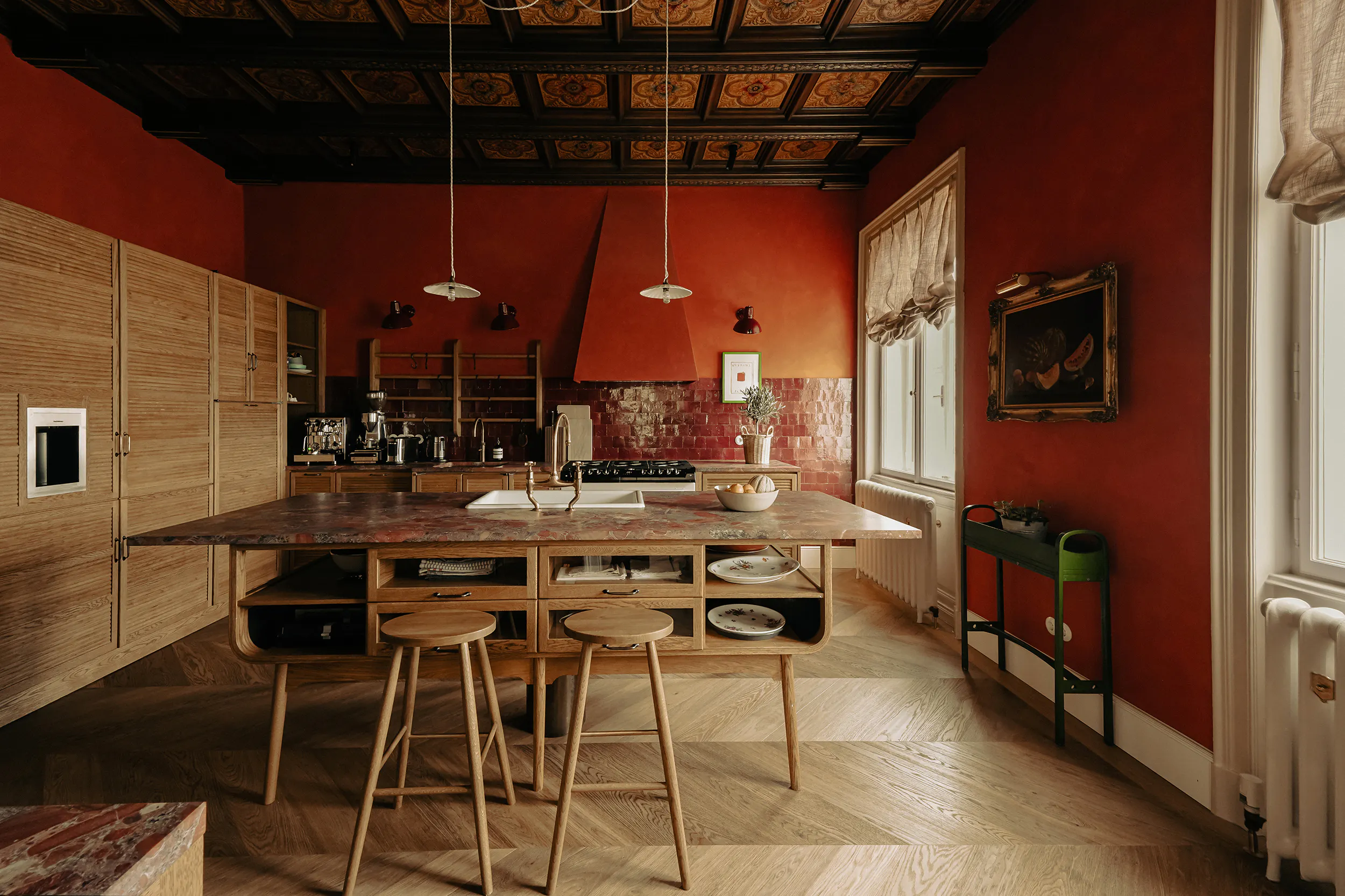 A bold red kitchen gives new life to this historical Viennese apartment ...