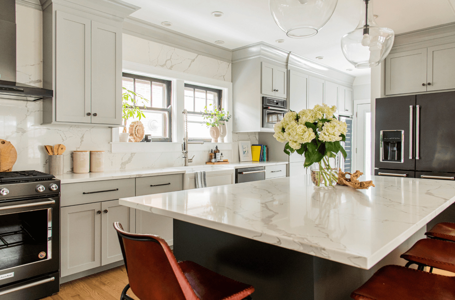 Colonial style kitchen with matching countertops and backsplash ...