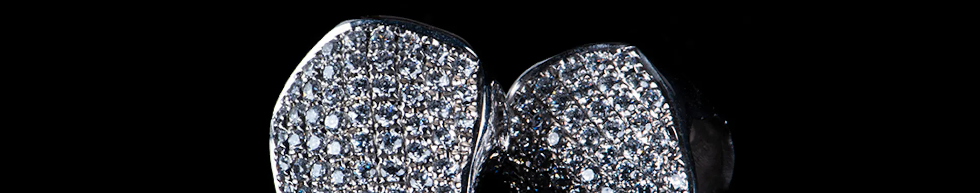 The rise of diamond veneers, crowns, and grills