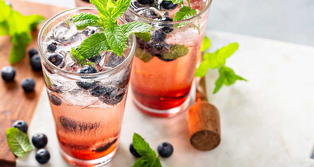 This berry-tastic American Collins will complete any summer evening ...