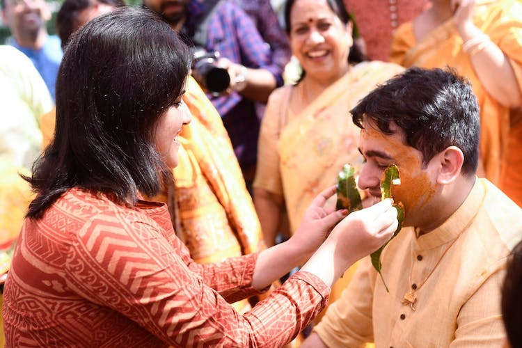 15 Stylish Haldi Ceremony Poses ideas For Couples