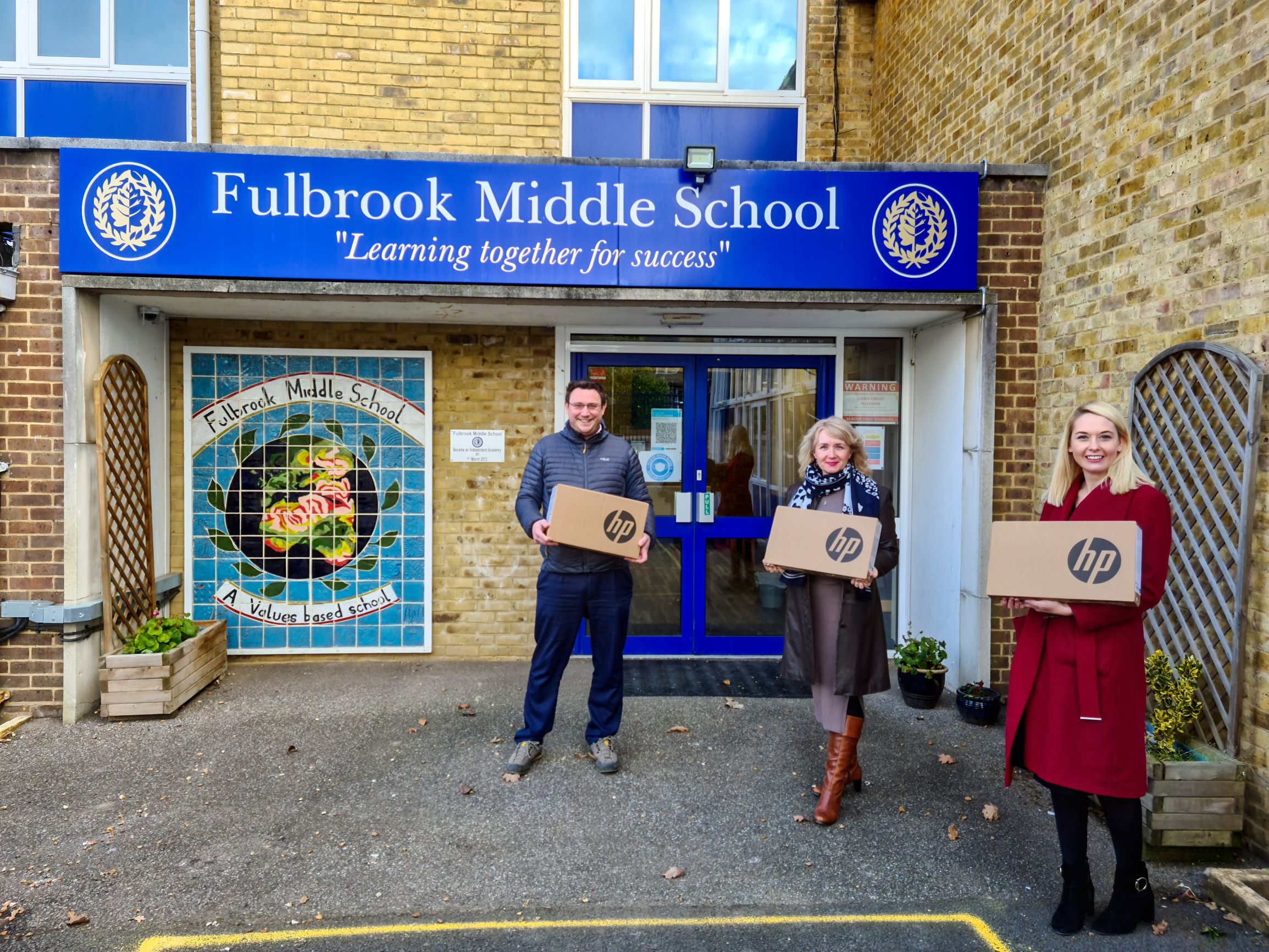 Hayfield donates new laptops to Fulbrook Middle School in Woburn Sands