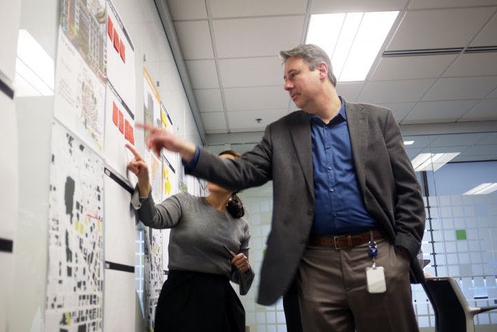 Workshop participants providing feedback on the themes and identifying ...