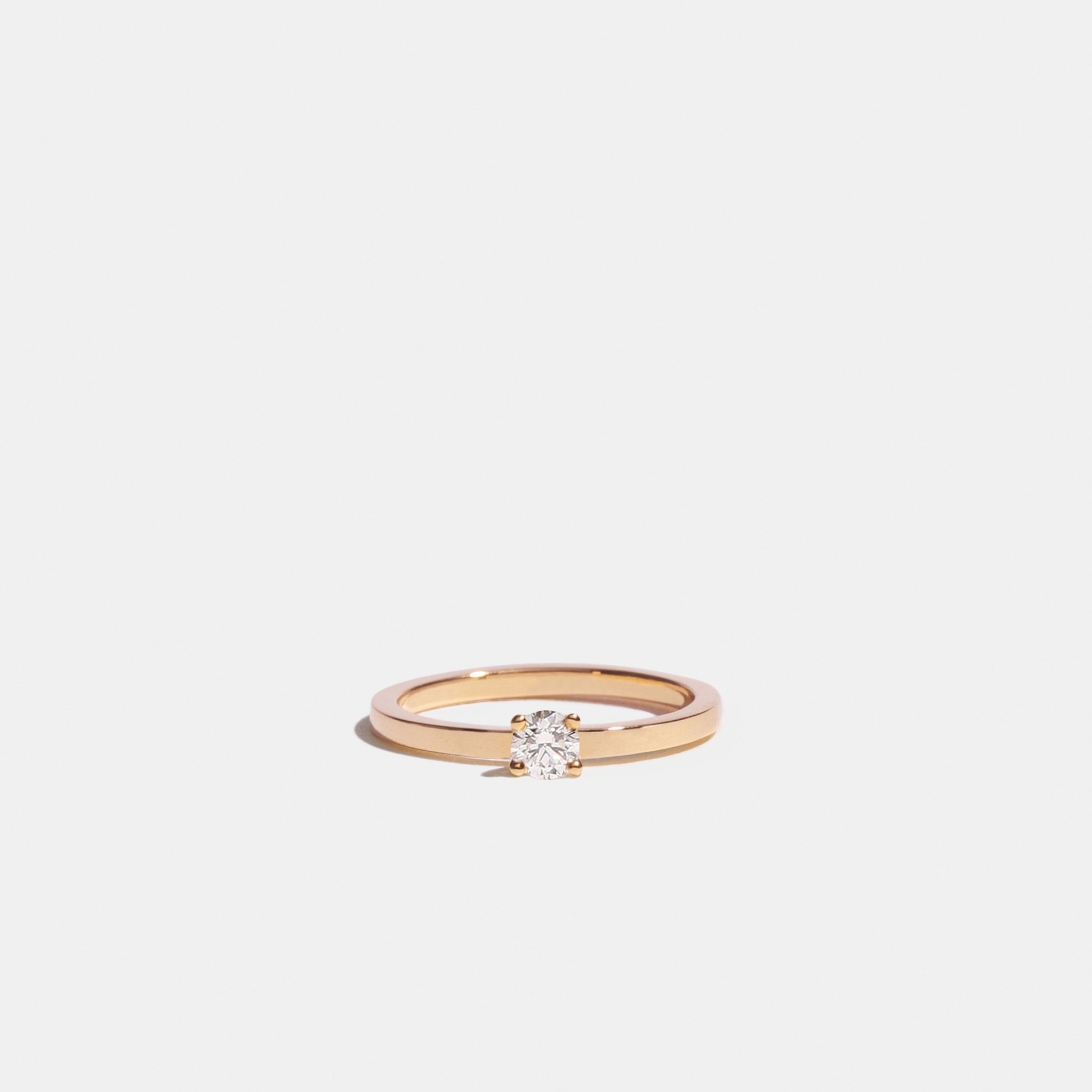 Anagramme flat ribbon Solitaire in rose gold Fairmined ethical set with ...