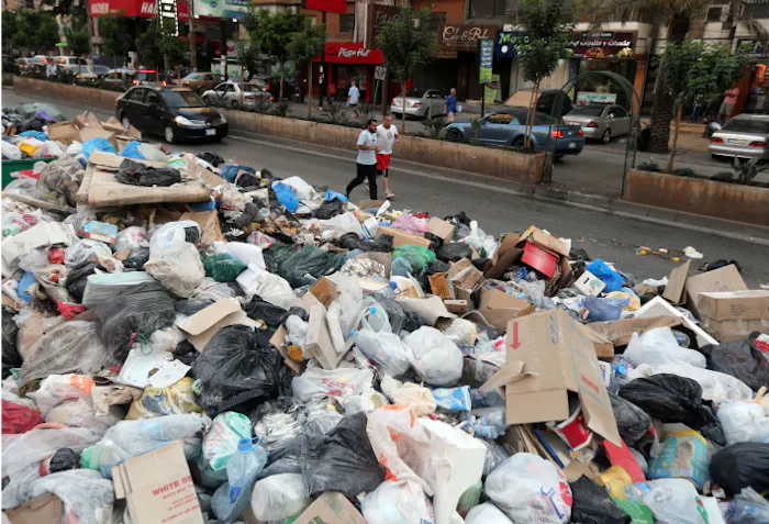 Garbage piles up on the streets of Beirut in 2015 following the closure ...
