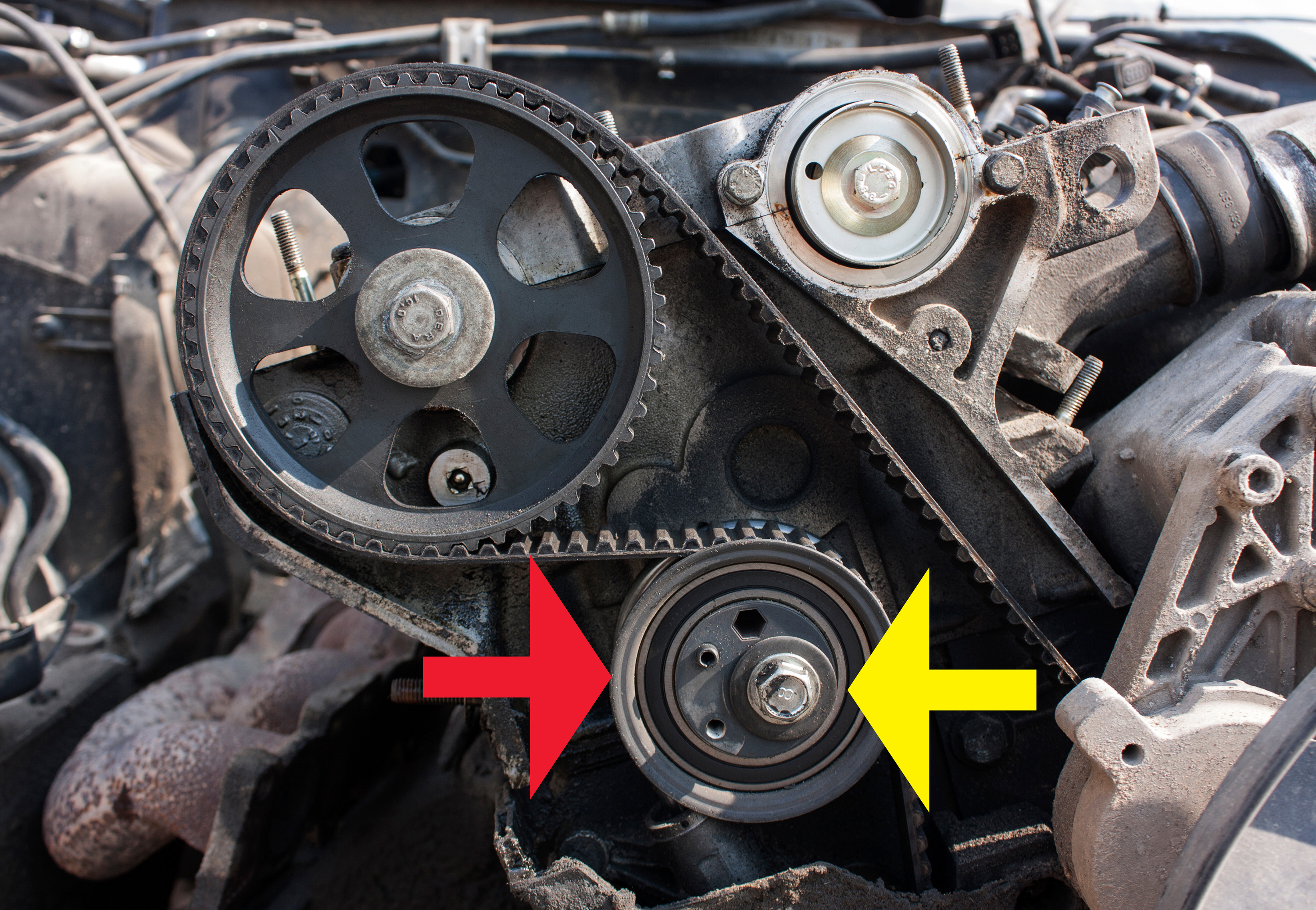 What is a timing belt tensioner?