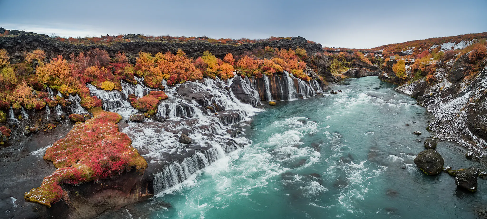 Guide to Hraunfossar Waterfall in Iceland | Perlan