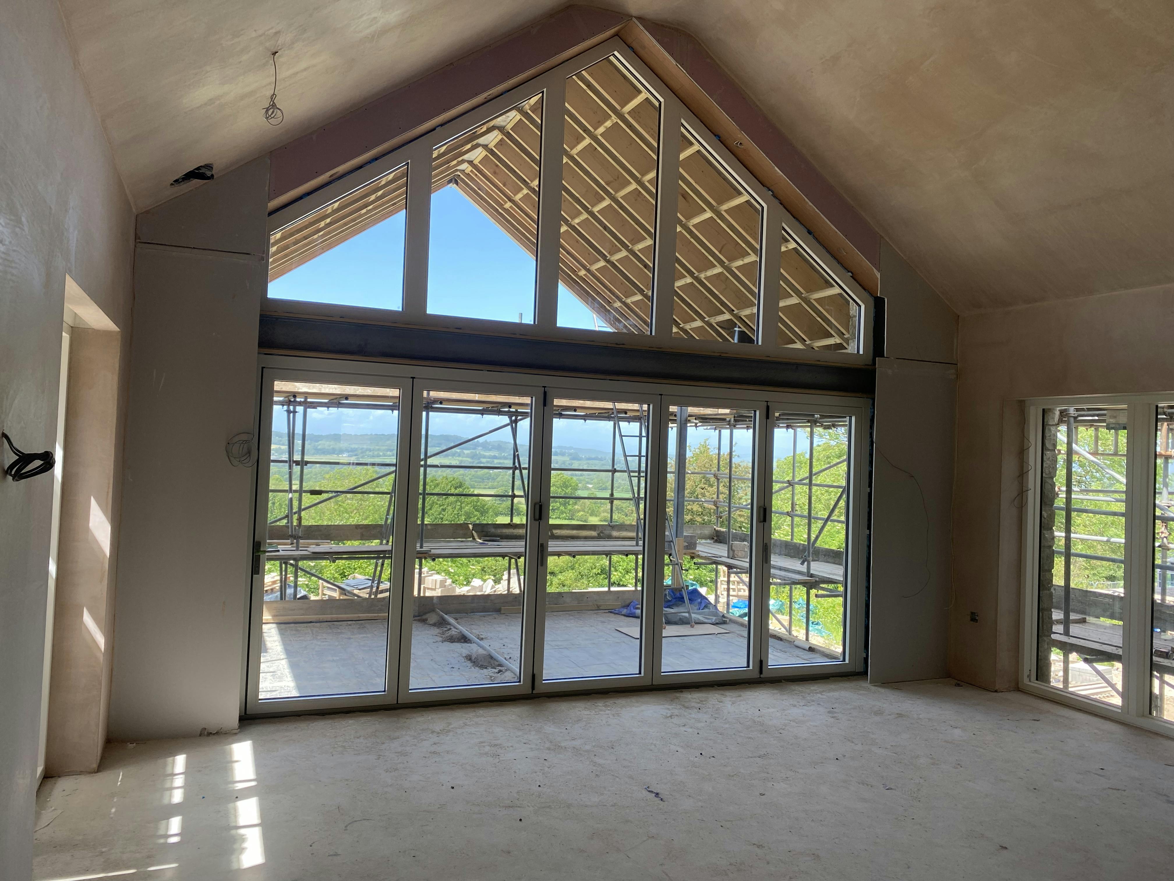 Bespoke glazing enhances views across Morecambe Bay | Solarlux By Reveal