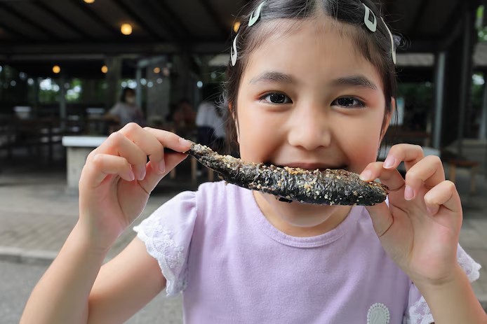 Vis op het menu maakt kinderen socialer en zorgzamer