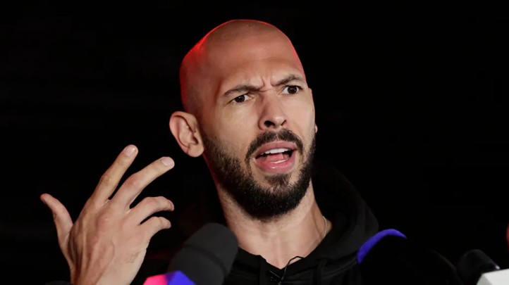 Tate 'pointed gun at woman', court documents claim