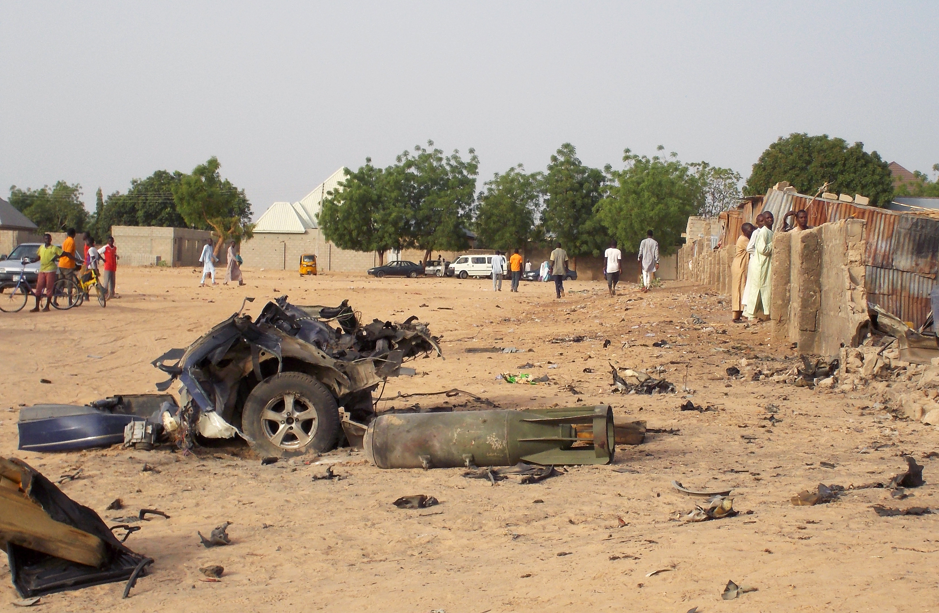 Roadside bombs kill 26
