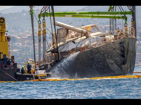 Recovered Bayesian superyacht transferred to Sicilian port on its final ...