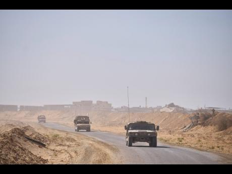 Israel insists on keeping troops in Gaza