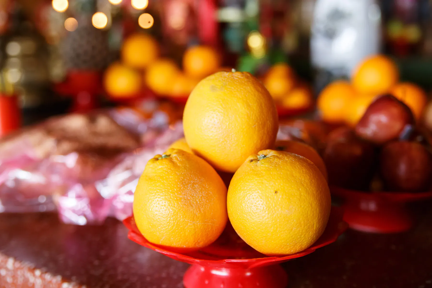Offering oranges to the Gods is a way to ask for good fortune and money.