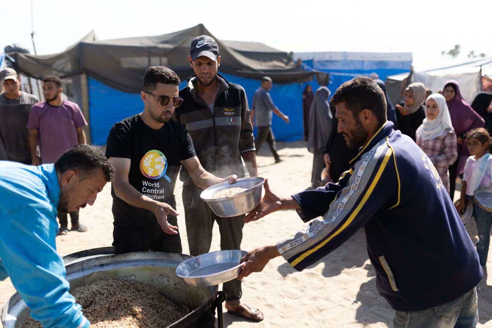 Blue background with abstract bubbles forming the continents of the world